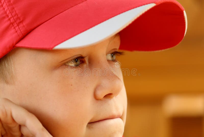 Portrait the boy in a cap stock image. Image of sight - 10730899