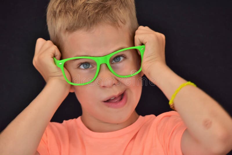 Portrait of a Boy with a Funny Face Stock Photo - Image of play, cute ...