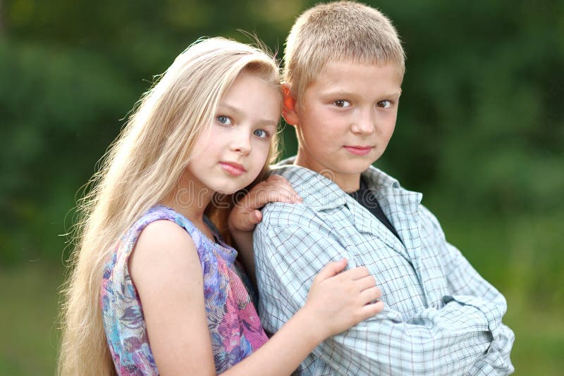 Portrait of a boy and girl stock photo. Image of girl - 45775368