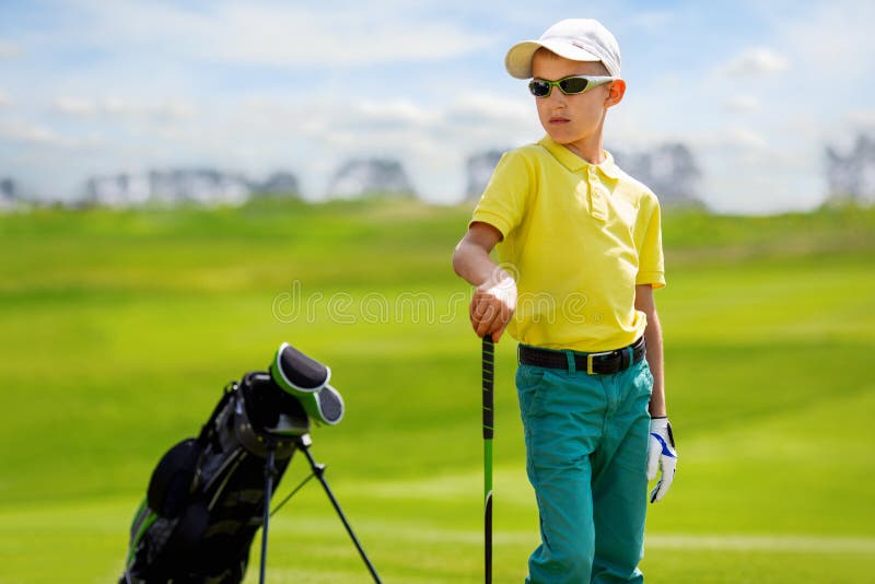 Portrait of boy golfer stock photo. Image of happy, grass - 58011812