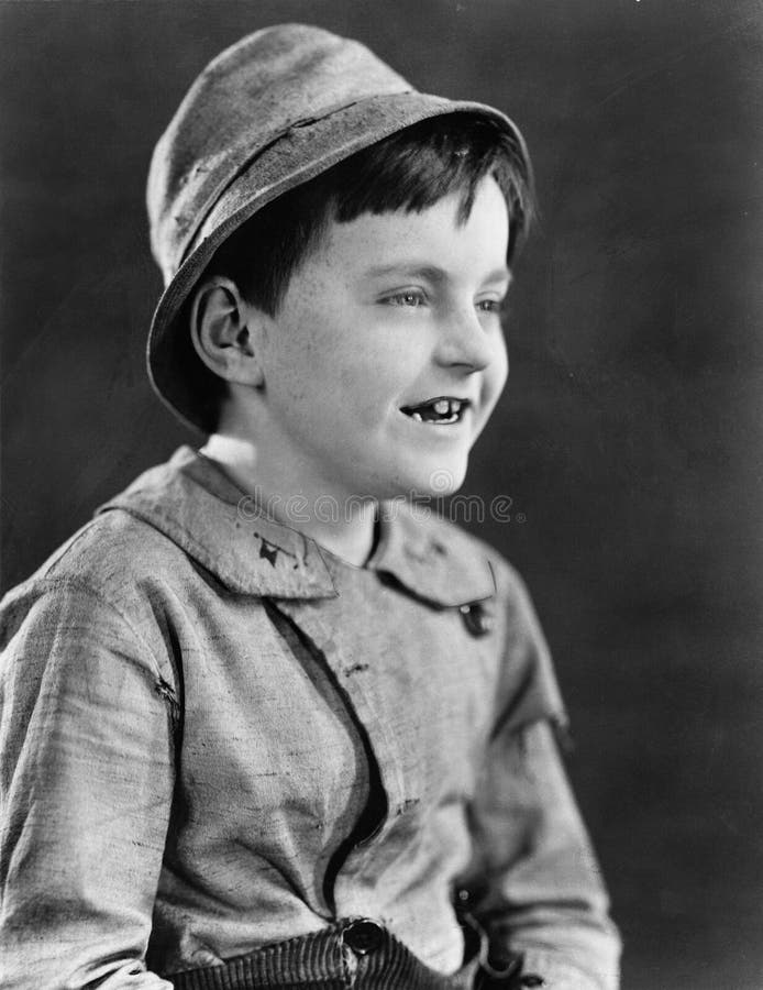 Portrait of a Boy in a Hat and Grinning Stock Image - Image of child ...