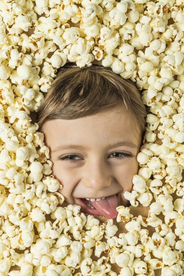 Portrait Boy His Face Surrounded Popcorn Stock Photos - Free & Royalty ...