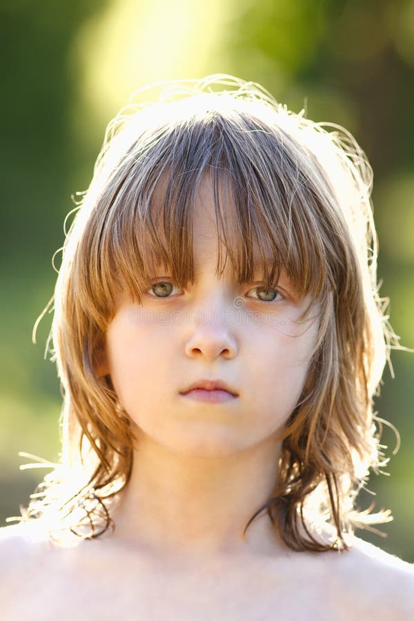 Portrait of a Boy with Long Blond Hair Stock Photo - Image of outdoors ...