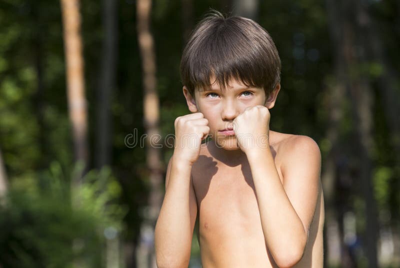 Portrait of a Boy in Nature Stock Photo - Image of hand, healthy: 79991592