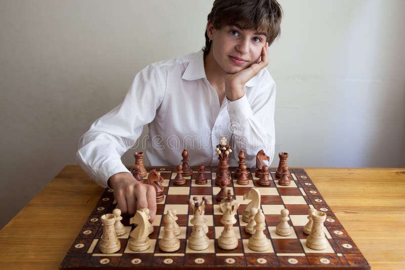 Portrait of a Boy Playing Chess Stock Image - Image of blond, indoors ...