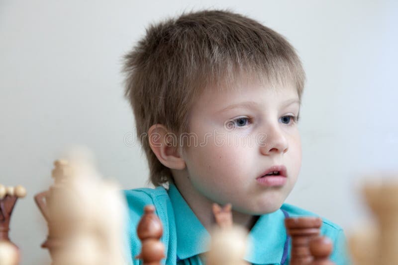 Portrait of a Boy Playing Chess Stock Photo - Image of happy ...