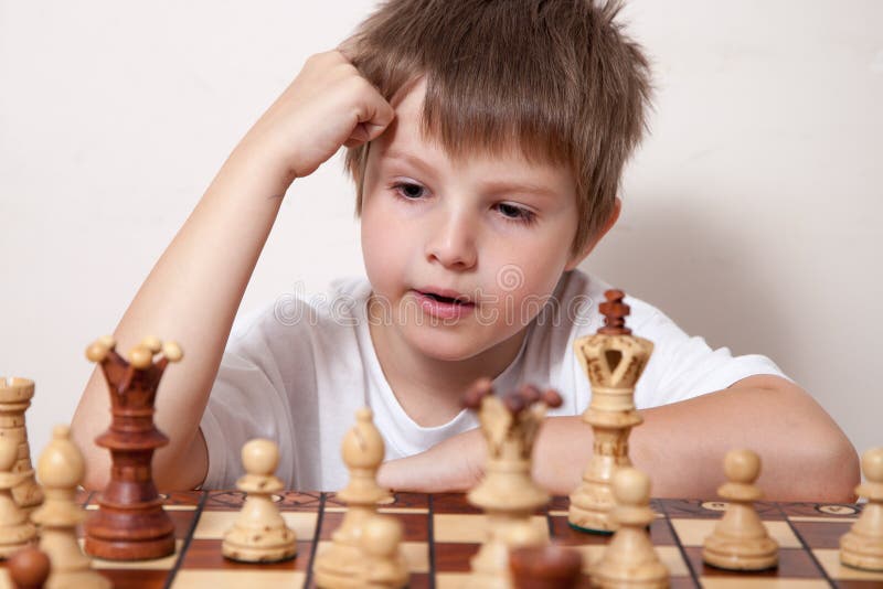 Portrait of a Boy Playing Chess Stock Image - Image of childhood ...