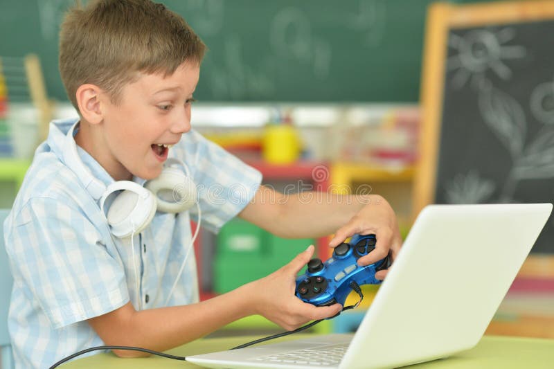 Portrait of Boy Playing Computer Game at Home Stock Photo - Image of ...