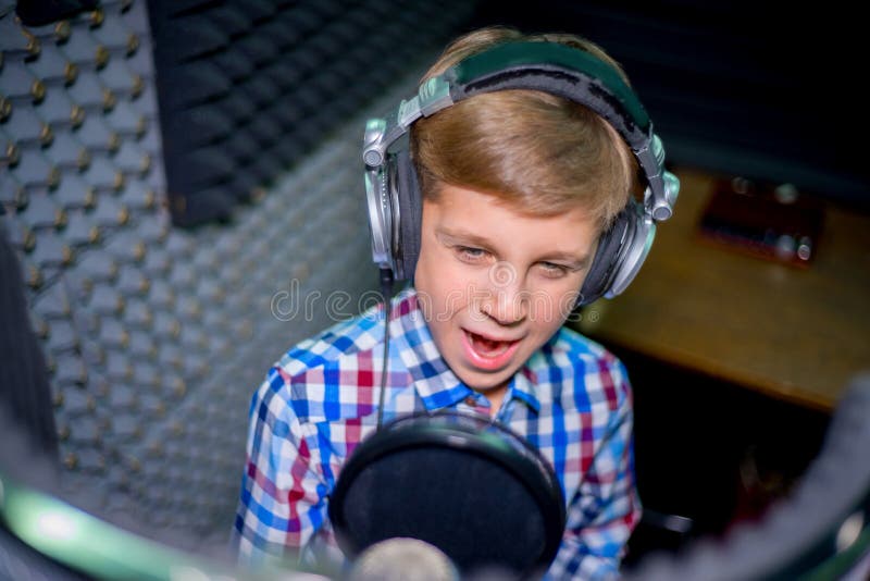 Boy in a recording studio stock photo. Image of broadcast - 107244462