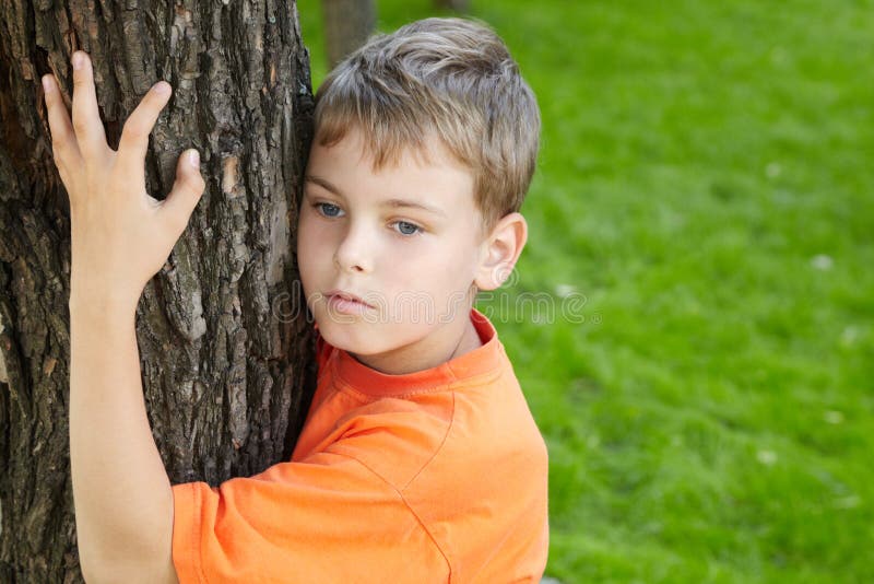 Portrait of Boy, that Stands, Embracing Tree Stock Image - Image of ...
