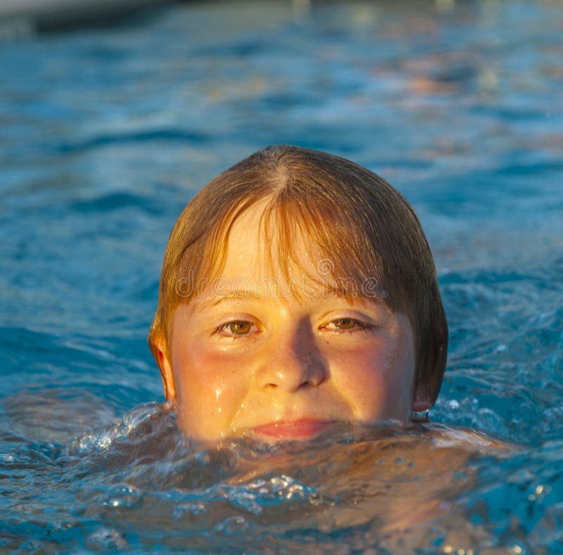 Portrait of a Boy Swimming in the Pool Stock Image - Image of caucasian ...