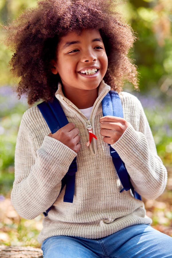 Portrait of Boy Walking through Bluebell Woods in Springtime Taking a ...