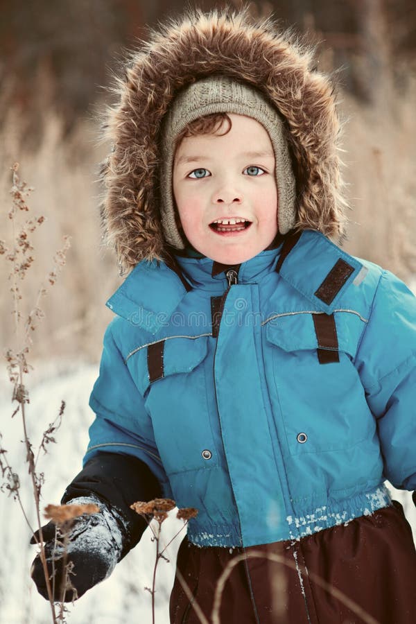 Portrait of Boy Walking, Winter Stock Image - Image of face, male: 23926065