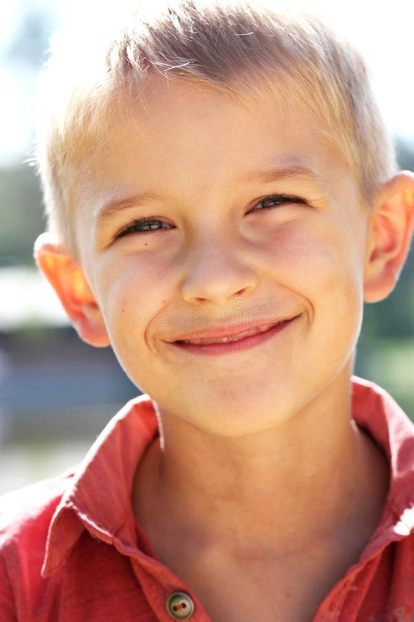 Portrait of a Boy Who Smiles. Stock Image - Image of white, face: 27742587