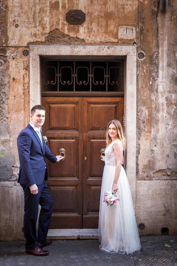 Portrait of Bride and Groom Posing on the Streets of Rome, Italy Stock ...
