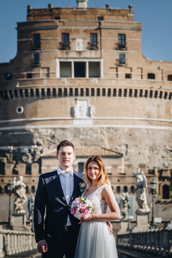 Portrait of Bride and Groom Posing on the Streets of Rome, Italy Stock ...