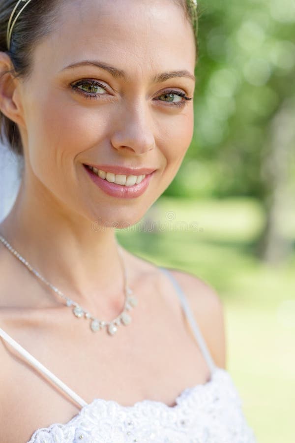 Portrait of Bride Smiling in Garden Stock Photo - Image of smiling ...
