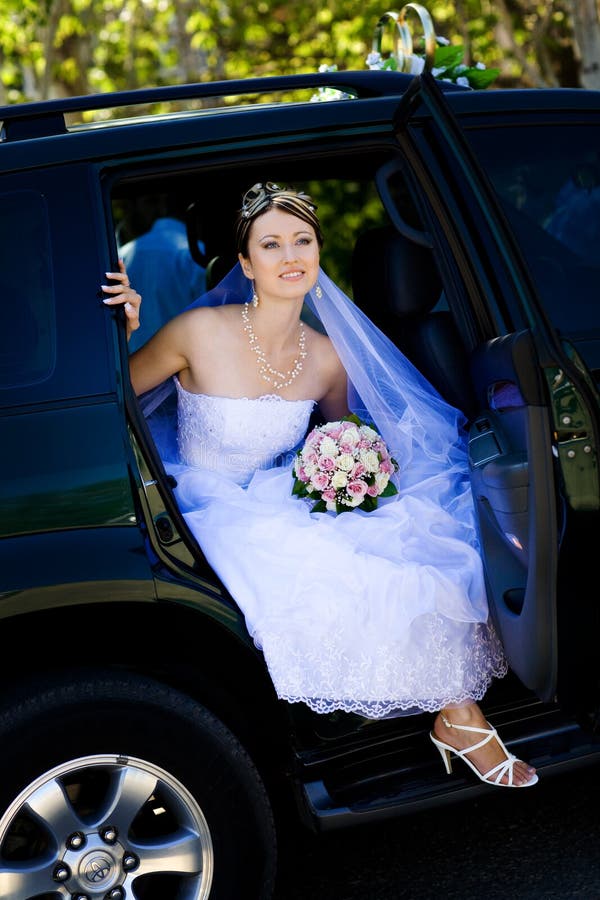 Bride Exiting Wedding Car Limo Stock Image - Image of limousine, love ...