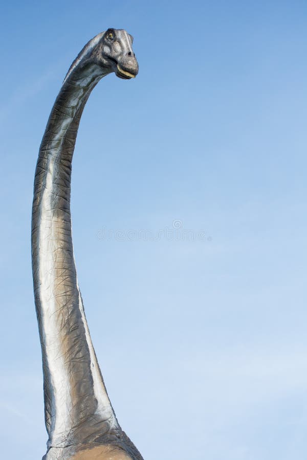 Portrait of a Brontosaurus Over Blu Sky Stock Photo - Image of creature ...
