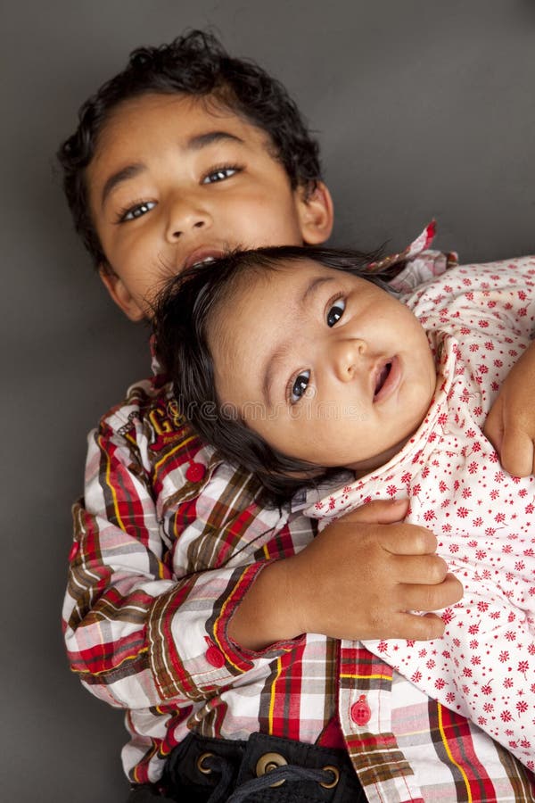 Gorgeous Brother and Sister Sunbathing on a Sandy Beach Stock Image ...