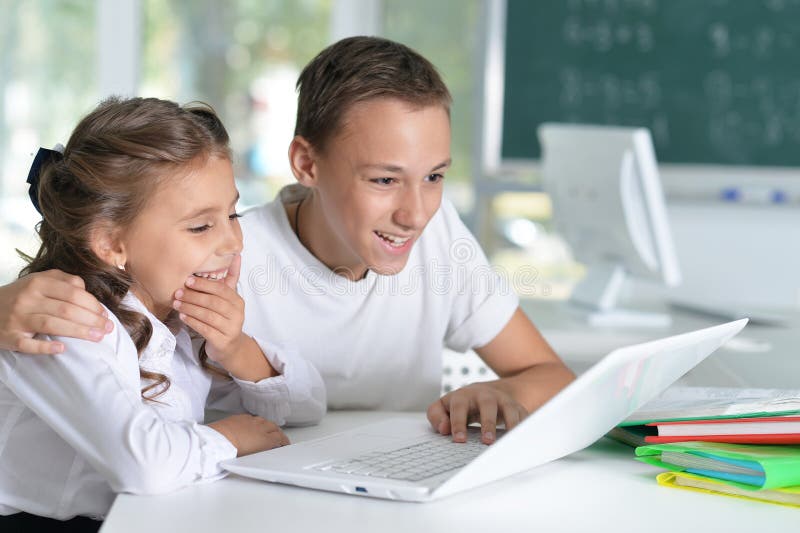 Portrait of Brother and Sister Doing Homework Stock Image - Image of ...