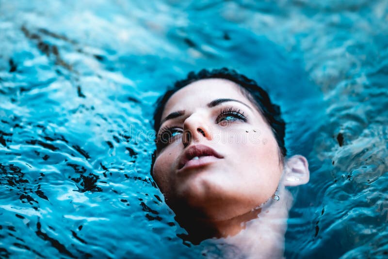 Portrait of a Brunette Female Swimming in a Pool Stock Photo - Image of ...