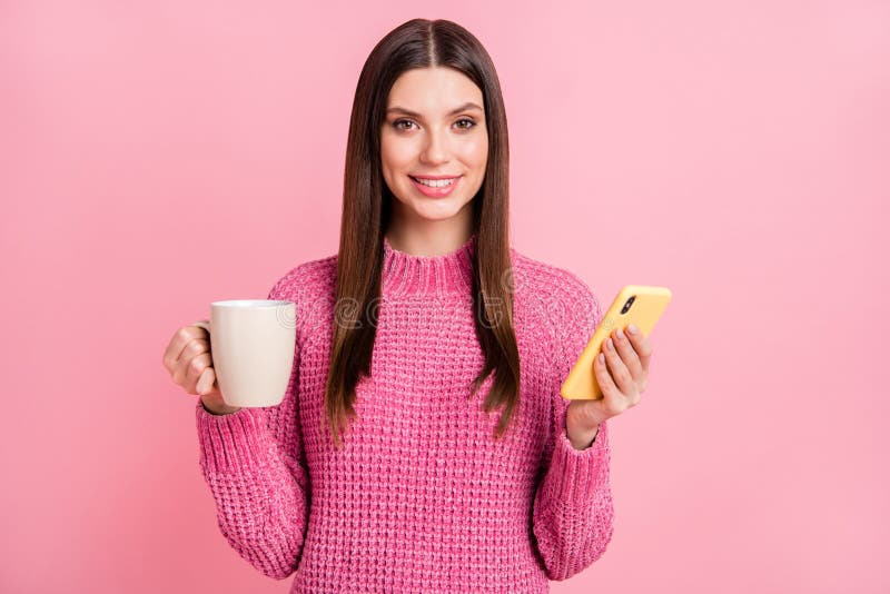 Portrait Of Brunette Optimistic Girl Hold Cup Telephone Wear Pink