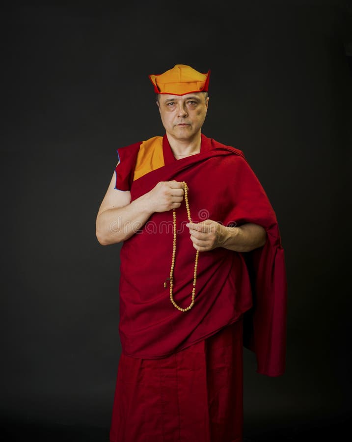 Portrait of a Buddhist Monk in a Ritual Red Kesa Robe for Ceremonies ...