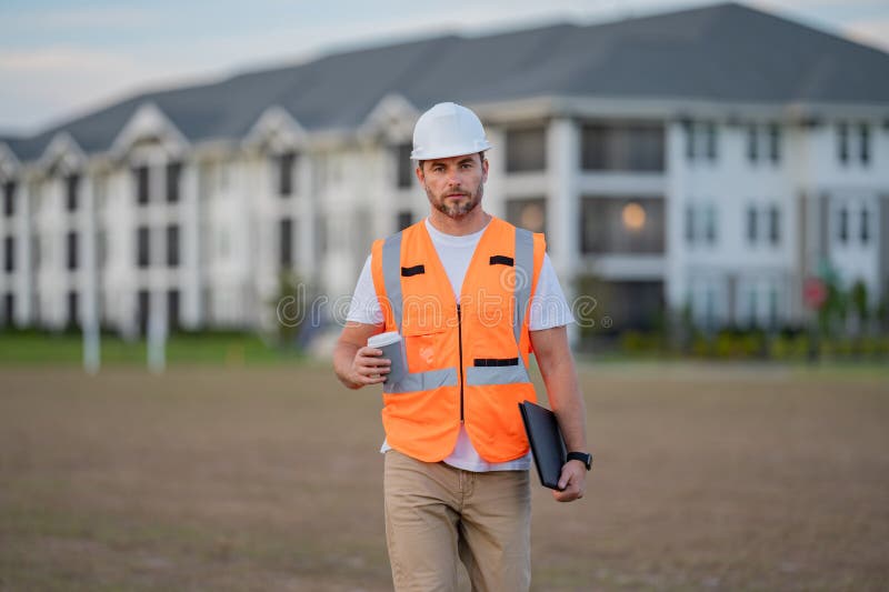 Portrait of Builder Man. Construction Worker with Hardhat Helmet on ...