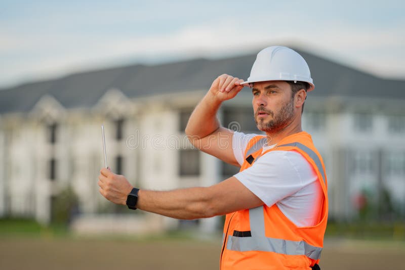 Portrait of Builder Man. Construction Worker with Hardhat Helmet on ...