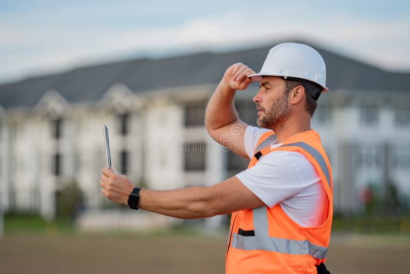 Portrait of Builder Man. Construction Worker with Hardhat Helmet on ...