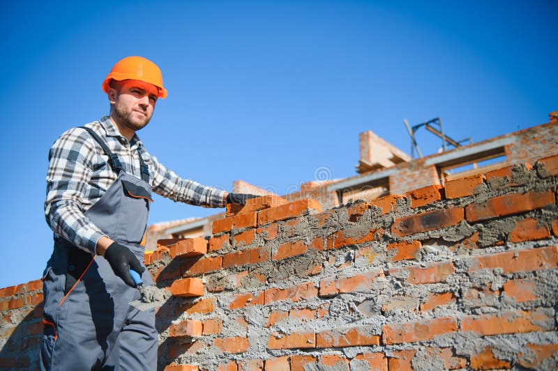 Portrait of a Builder in the Process of Working on a Construction Site ...