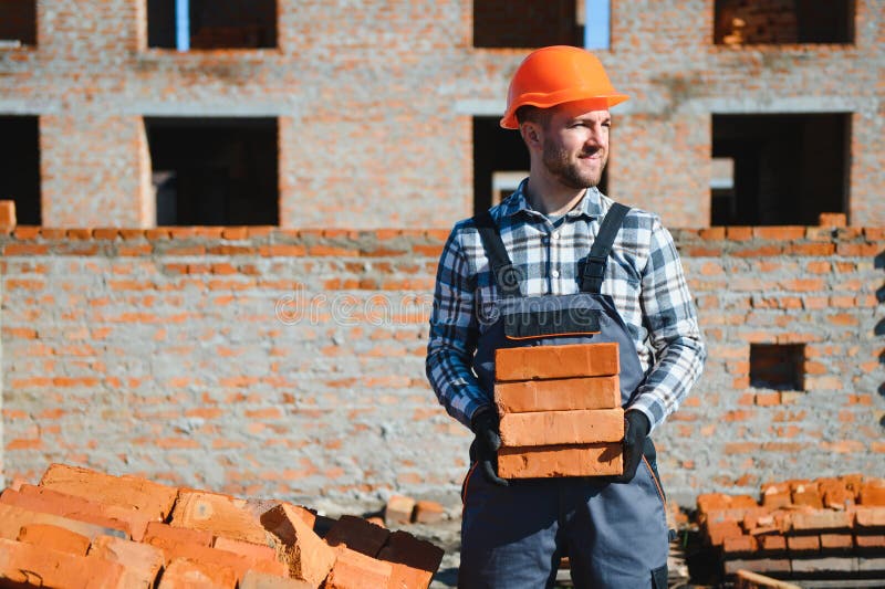 Portrait of a Builder in the Process of Working on a Construction Site ...