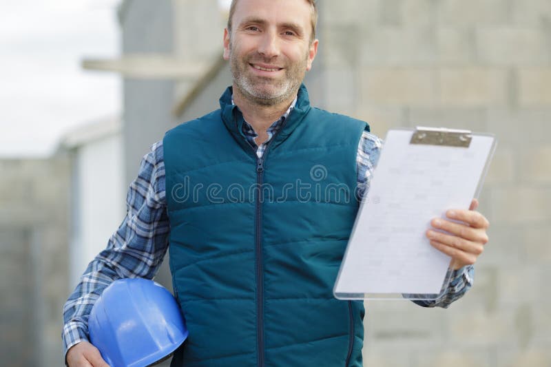 Builder Smiling Confident Standing at Construction Site Stock Image ...