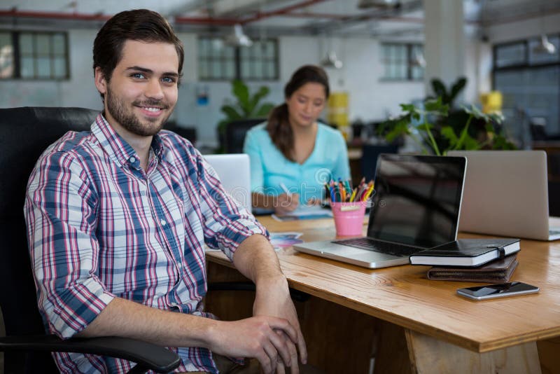 Portrait of Business Executive Working on Desk in Office Stock Image ...