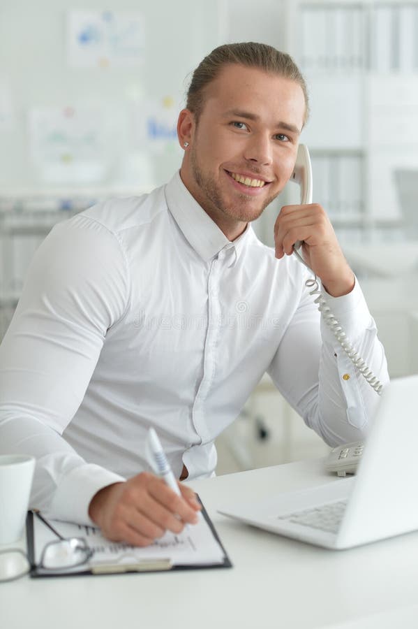 Portrait of a Smiling Business Man Using a Laptop. Stock Photo - Image ... Portrait of a Smiling Business Man Using a Laptop. Stock Photo - Image ...