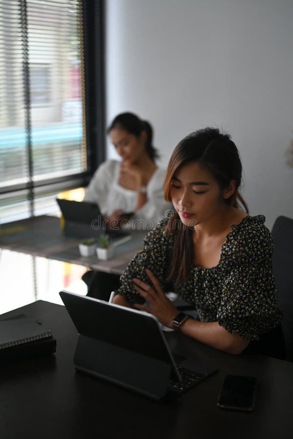 Portrait of Business People are Sitting in Workspace and Working on ...