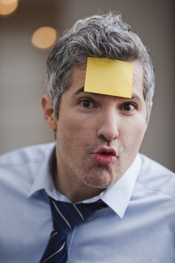 Portrait of a Businessman with Adhesive Note on Forehead Stock Image ...