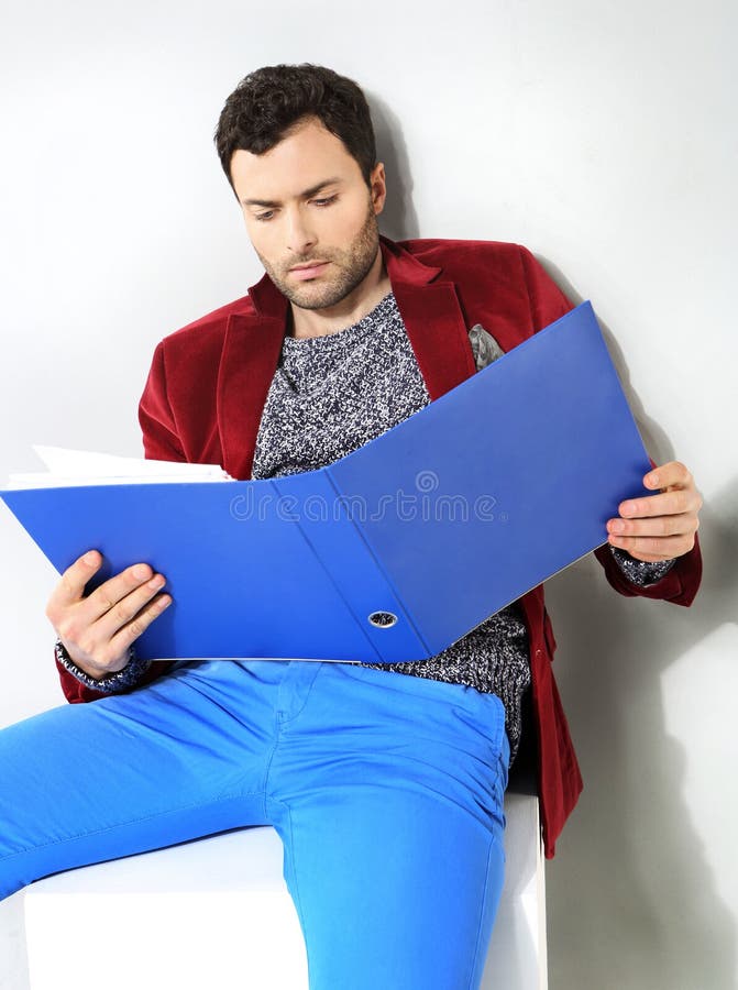 Portrait of Businessman with a Blue Folder of Stock Image - Image of ...