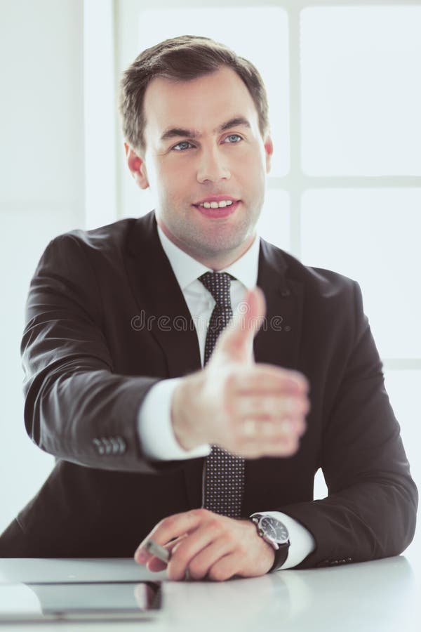 Portrait Of Businessman Giving Hand For Handshake. Stock Photo - Image ... Portrait Of Businessman Giving Hand For Handshake. Stock Photo - Image ...