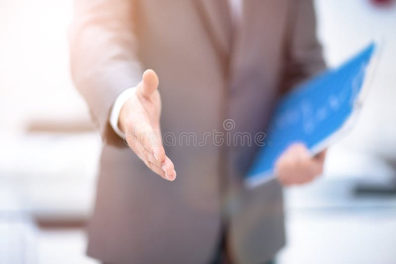 Portrait of a Businessman Giving a Hand Stock Image - Image of office ...