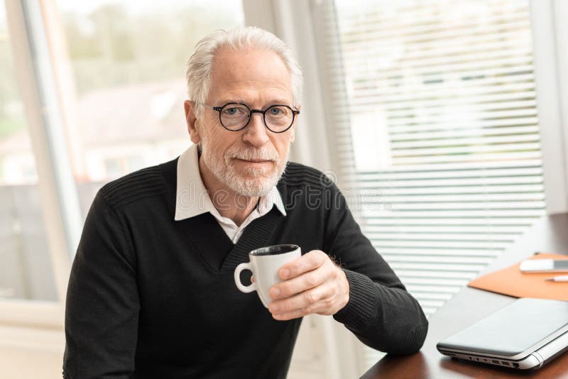 Portrait of Businessman Having Coffee Break Stock Image - Image of ...