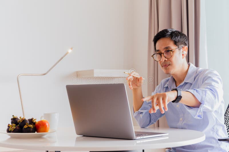 Portrait of Businessman Having Video Call on Laptop Computer. Stock ... Portrait of Businessman Having Video Call on Laptop Computer. Stock ...