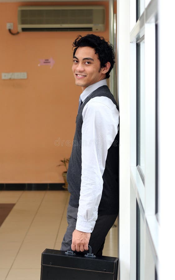 Portrait of a Businessman Holding a Briefcase Stock Photo - Image of ...