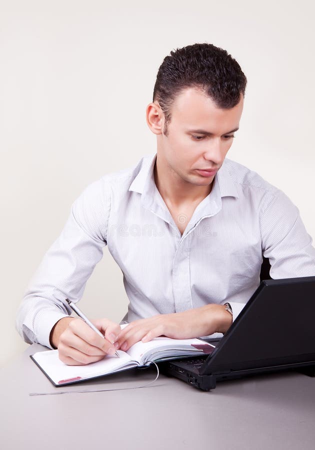 Portrait of Businessman Making Notes Stock Image - Image of diary ...