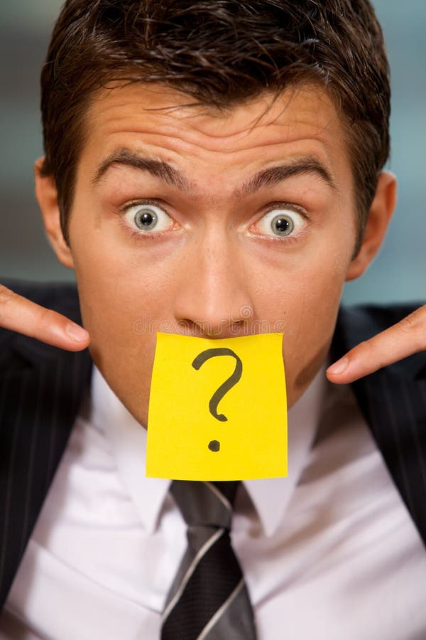 Portrait of Businessman in Office with Question Mark Written on Stock ...