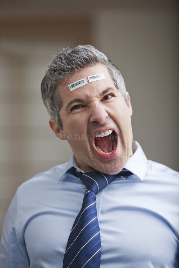 Portrait of a Businessman Shouting with Barcode on Forehead Stock Photo ...