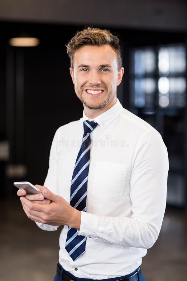 Portrait of Businessman Typing a Text Message in Office Stock Image ...