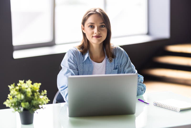 Portrait of a Businesswoman Using Laptop in Office Stock Image - Image ...