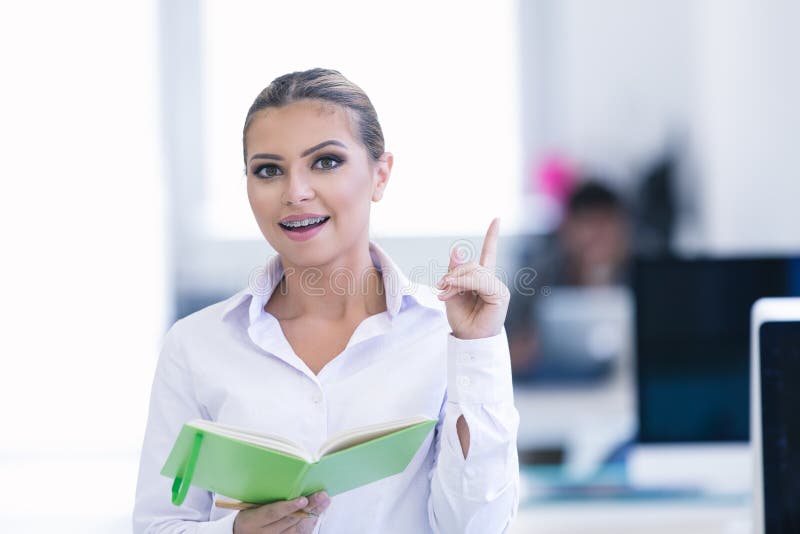 Portrait of Busy Secretary Looking at Camera Stock Image - Image of ...